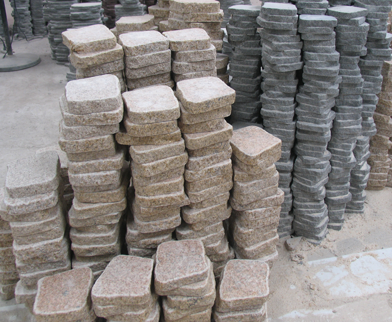 Manufacturer of tumbled Granite Cobblestone Newstar Stone